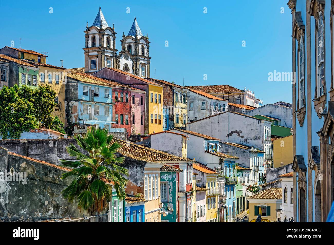 Colorful houses facades and historic church towers in baroque and ...