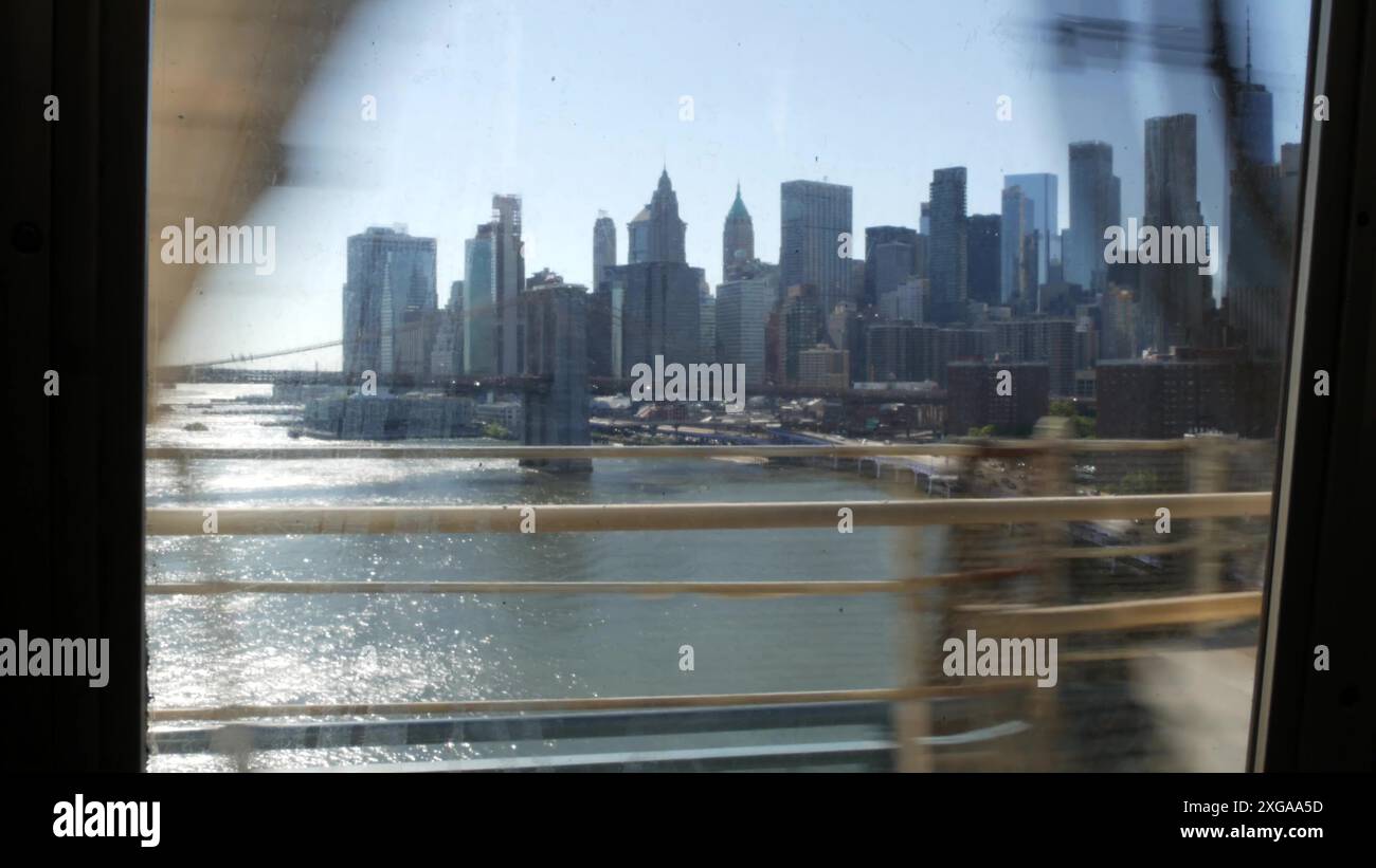 New York City subway train, Manhattan bridge. Shaking camera thru dirty ...
