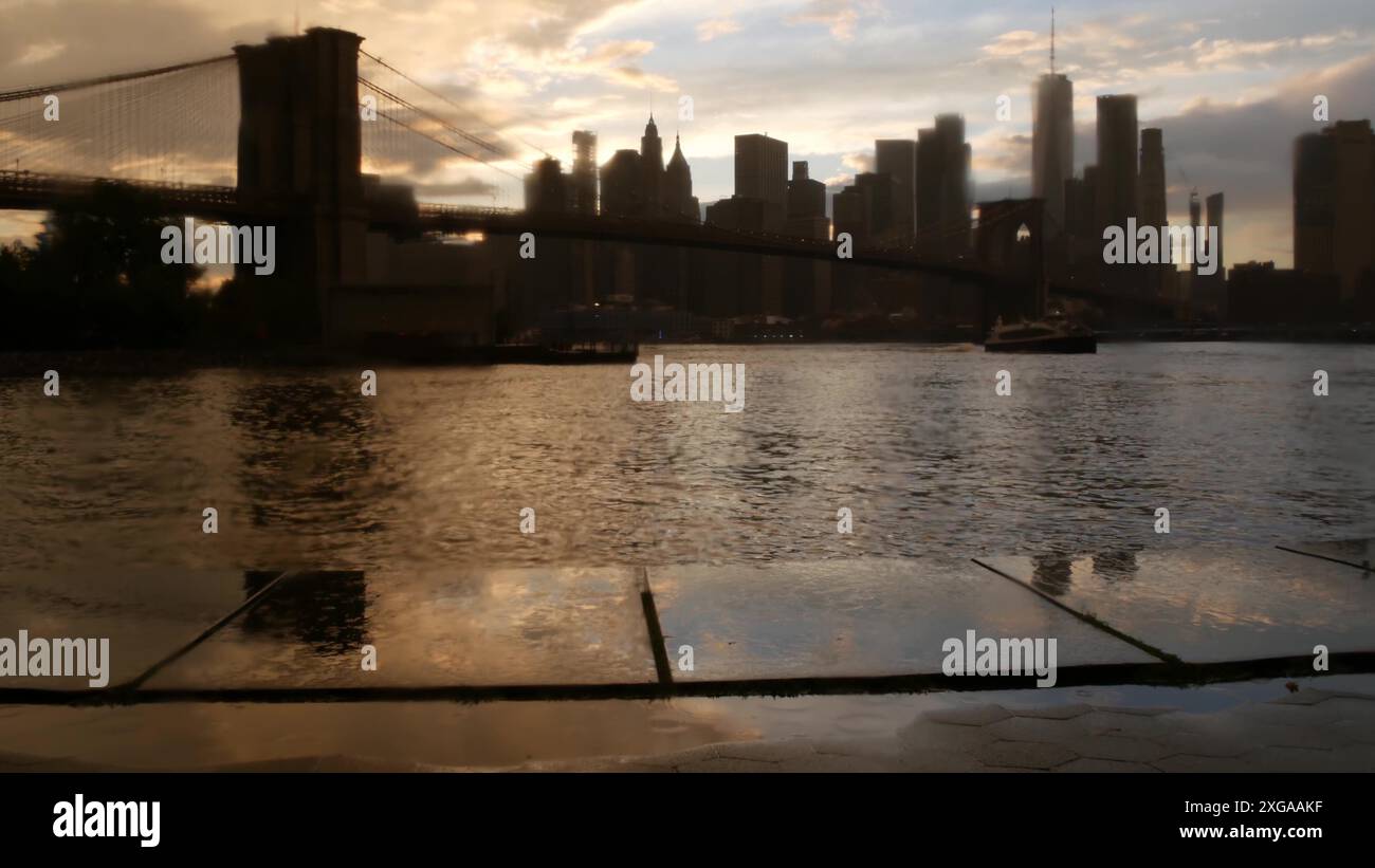 Brooklyn Bridge, rainy foggy day. New York City Manhattan downtown ...