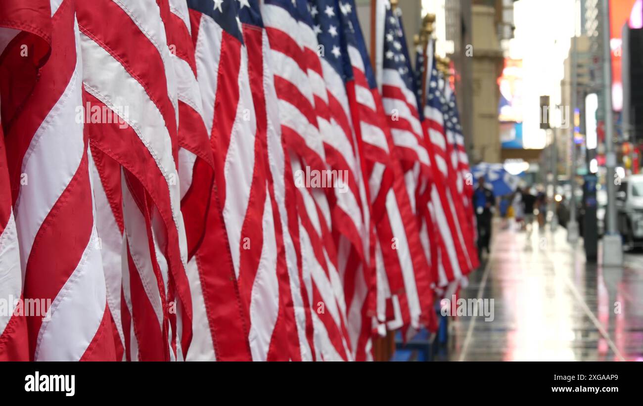 New York, row of american flags. Manhattan midtown near Broadway Times ...
