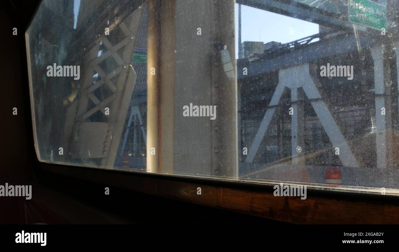 New York City subway train, Manhattan bridge. Shaking camera thru dirty ...