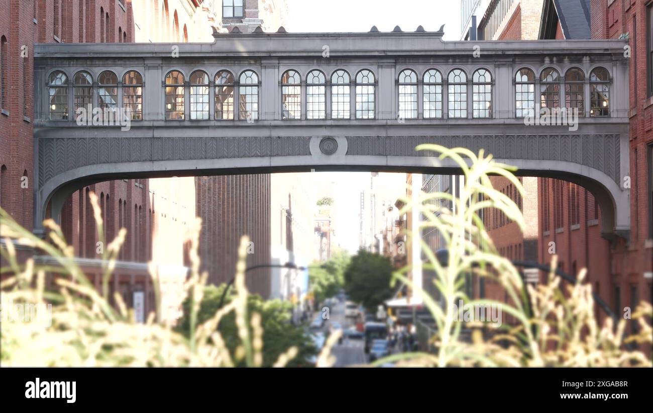New York City street, Chelsea Market skybridge. Retro industrial ...