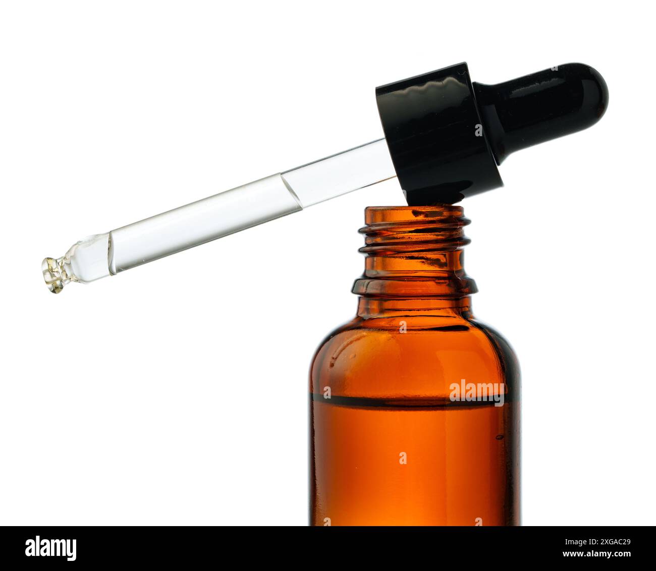 Close up dropper releasing liquid hi-res stock photography and images ...