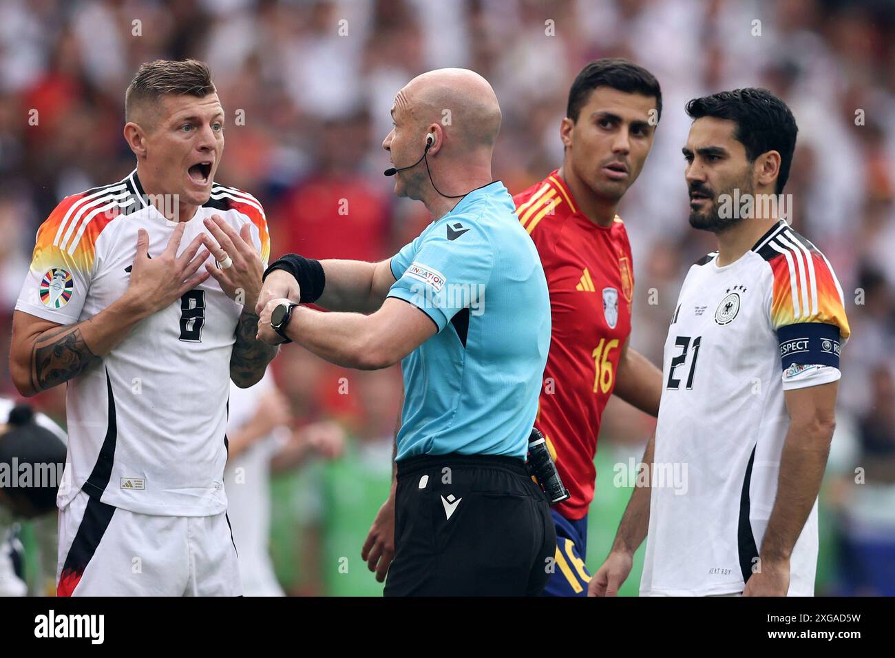 STUTTGART, GERMANY - JULY 05: Toni Kroos of Germany talks to Referee ...