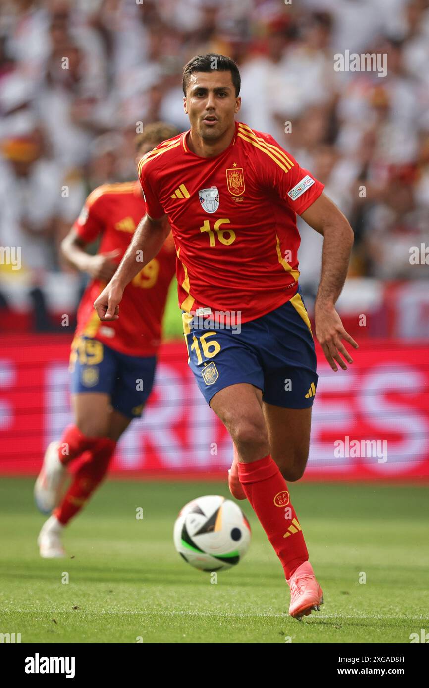 STUTTGART, GERMANY - JULY 05: Rodri of Spain runs with a ball during ...