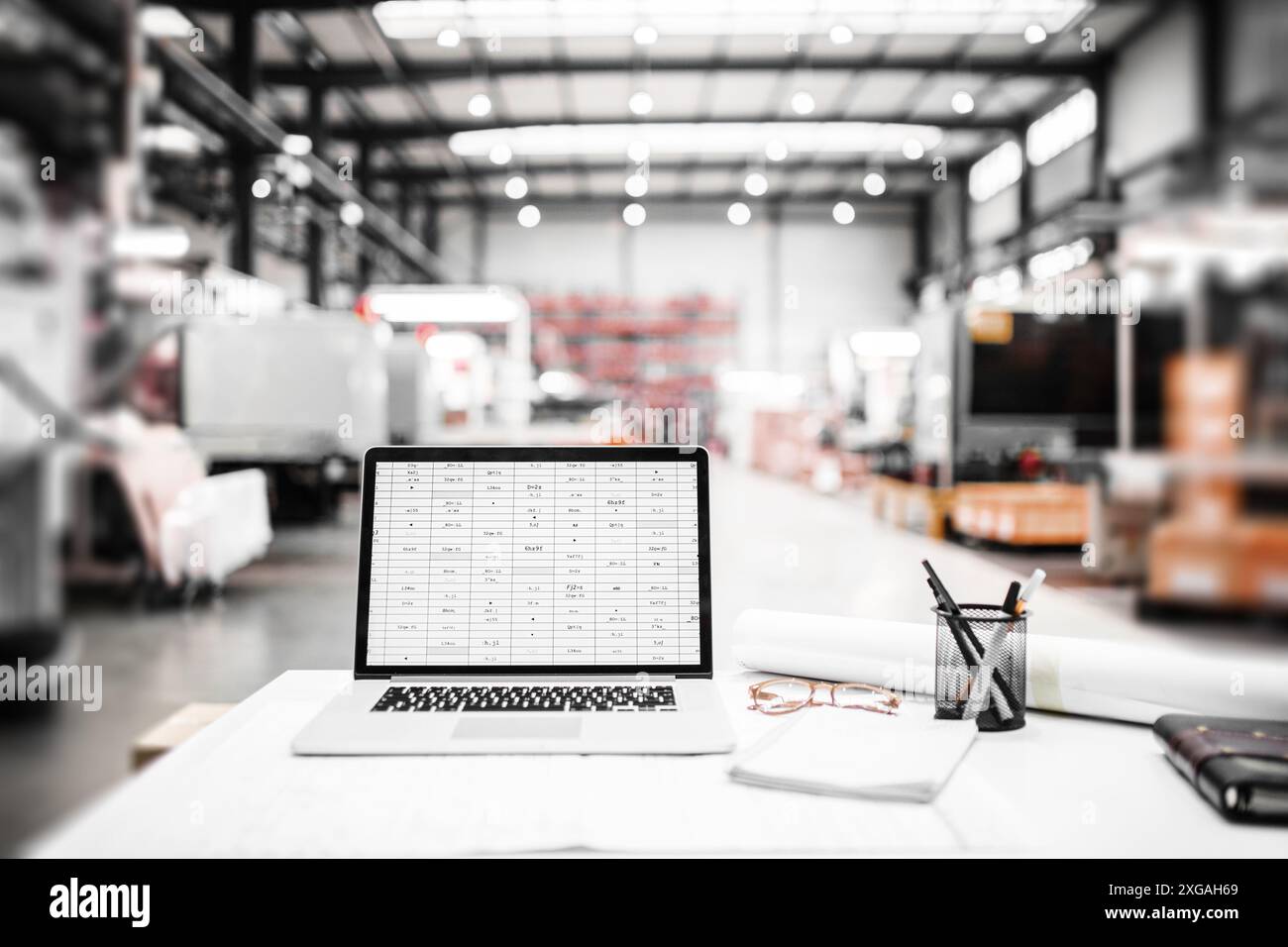 Laptop in modern industrial factory, with open software Stock Photo - Alamy