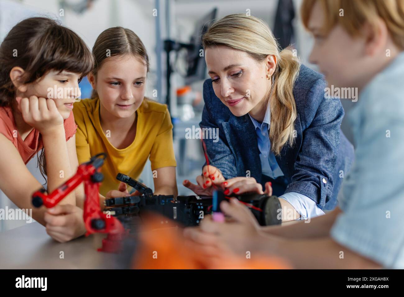 Children learning robotics in Elementary school. Young students ...