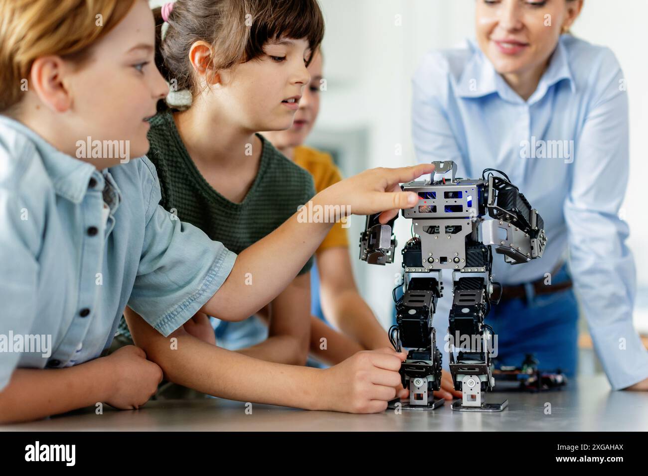Children learning robotics in Elementary school. Young students ...