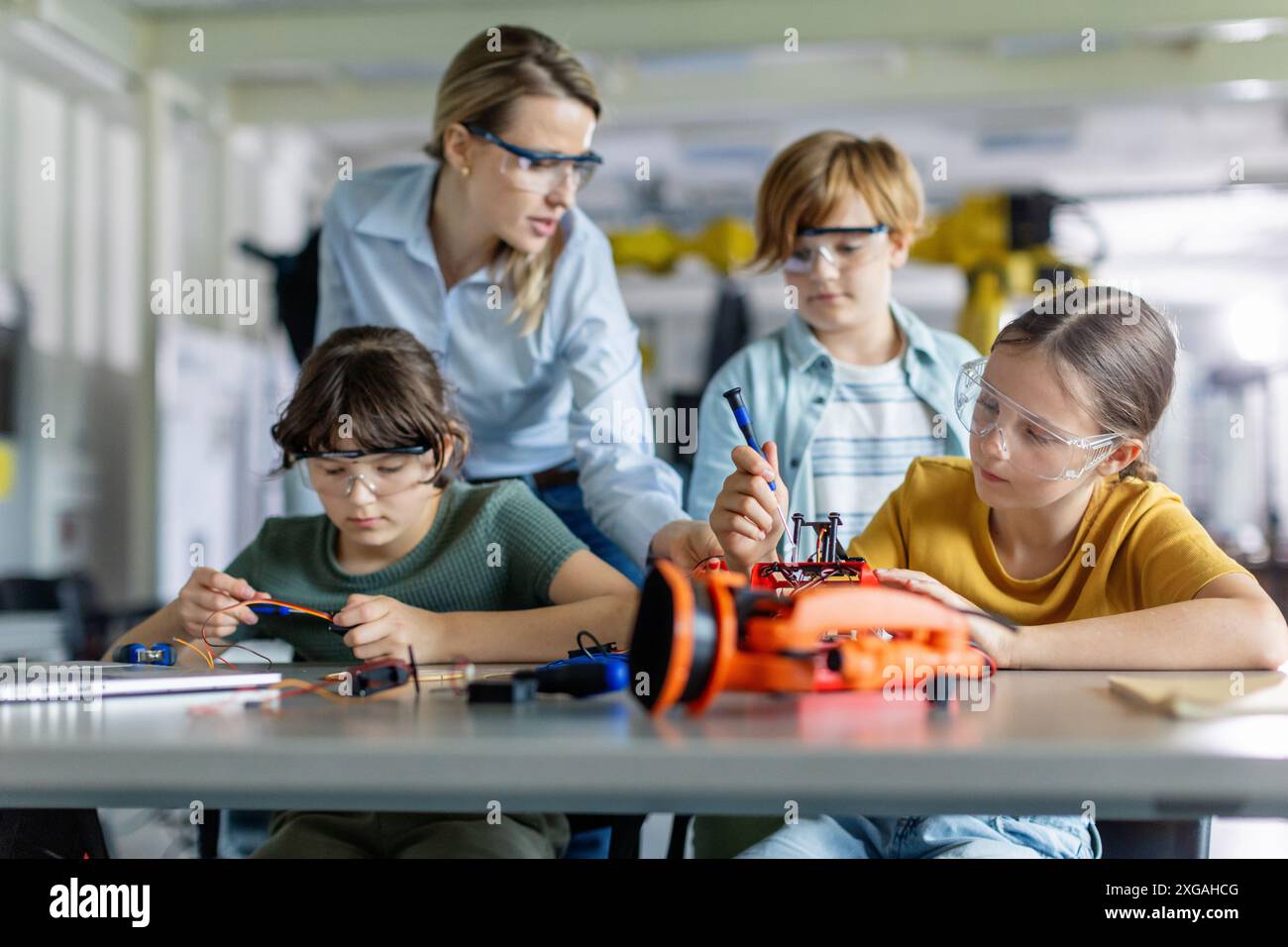 Children learning robotics in Elementary school. Young students ...