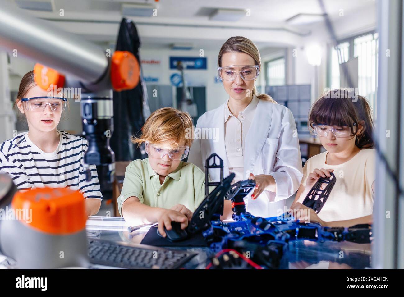 Children learning robotics in Elementary school. Young students ...