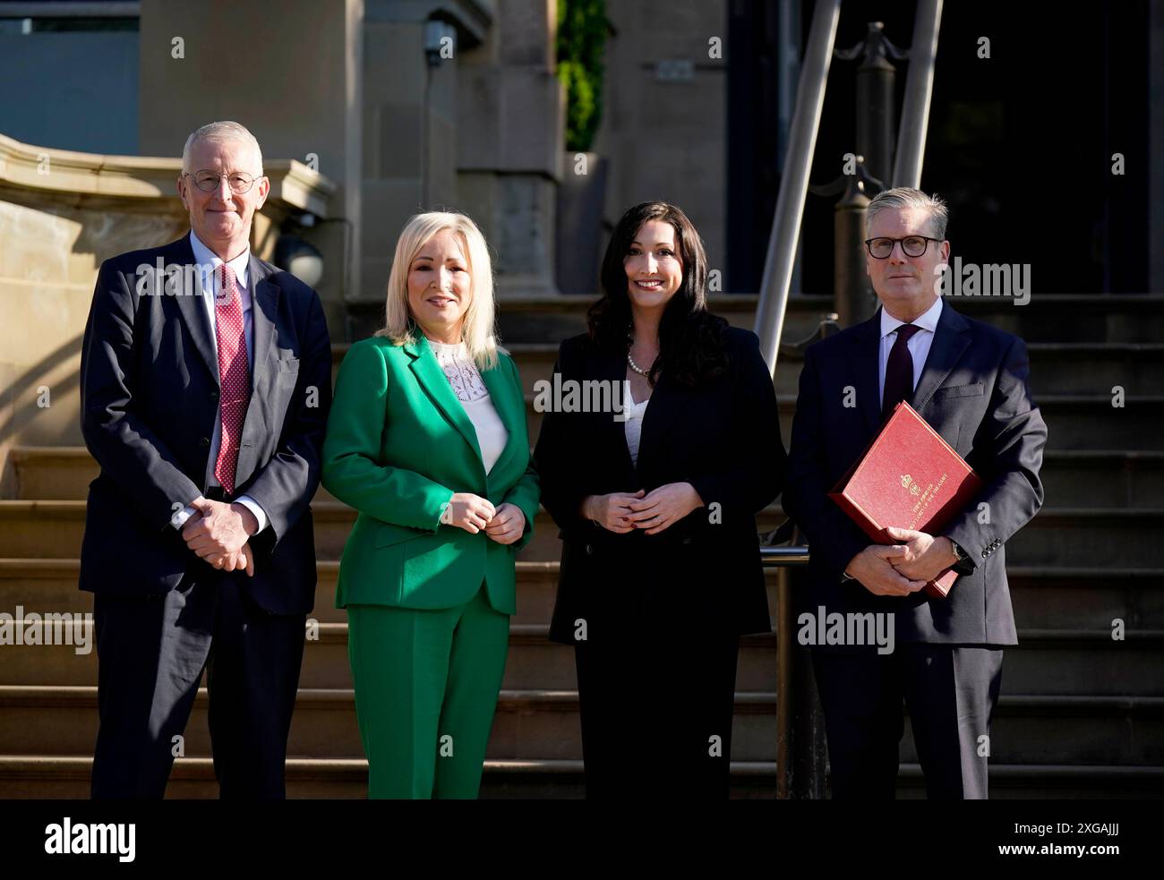 (left to right) Northern Ireland Secretary Hilary Benn, First Minister ...