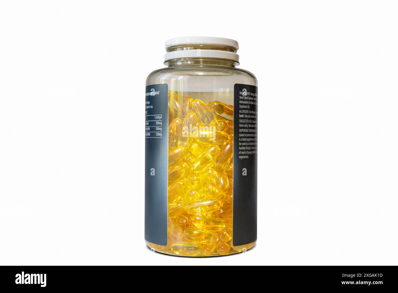 A glass bottle with a white cap is filled with yellow softgel capsules ...