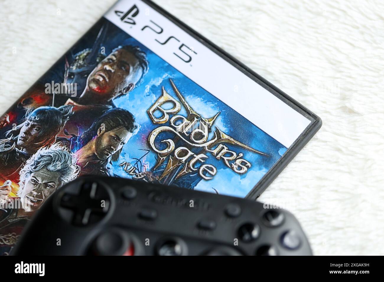 KYIV, UKRAINE - JUNE 26, 2024 Baldur's Gate 3 PS5 video game disc box ...