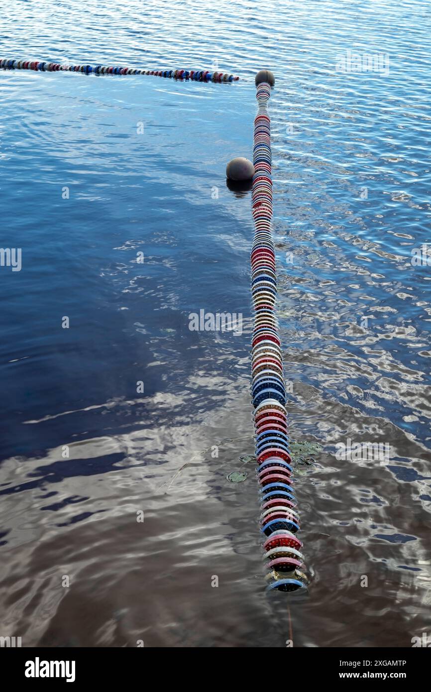 floating barrier line on shallow lake beach Stock Photo - Alamy