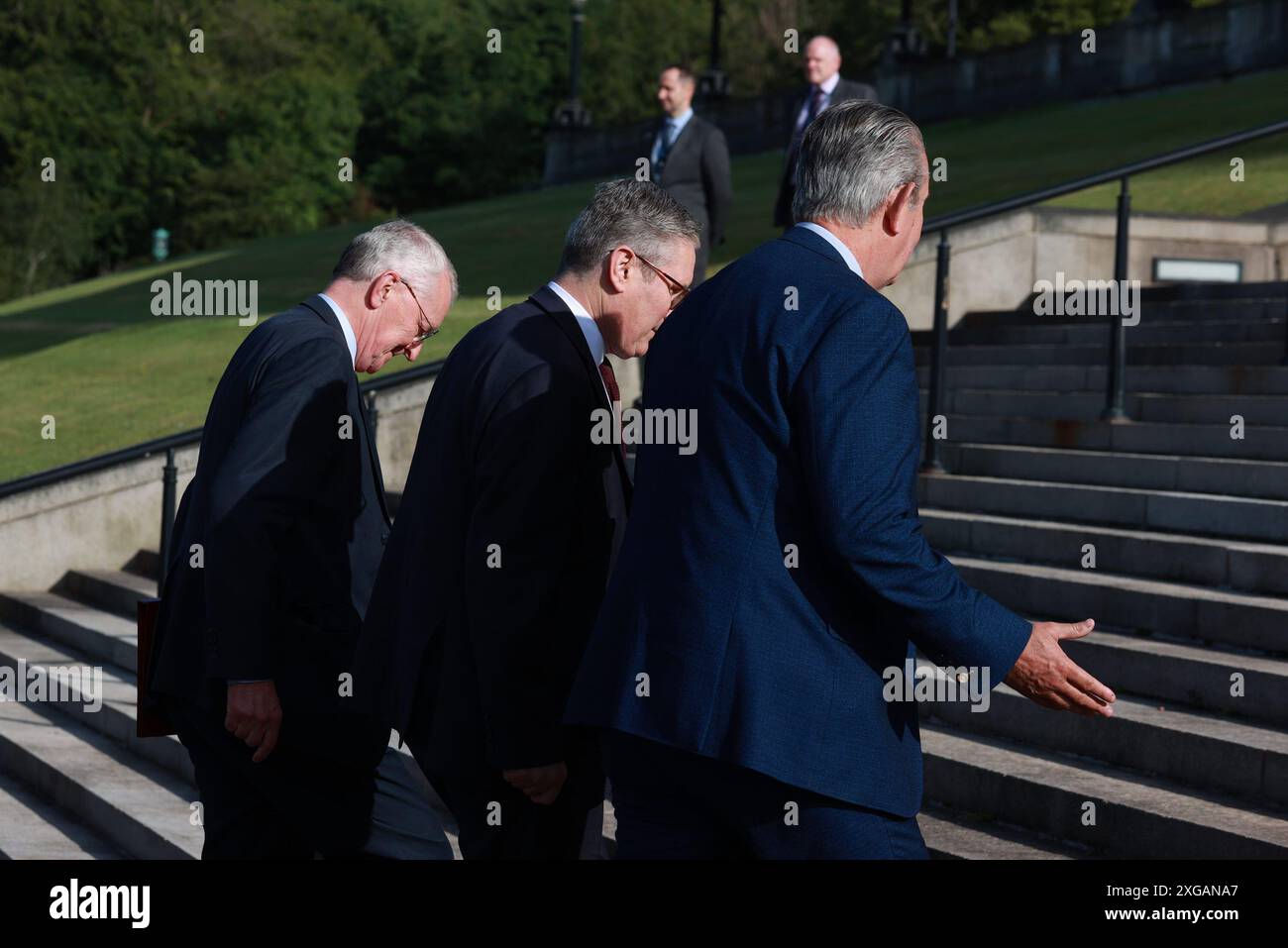 Prime Minister Sir Keir Starmer (centre) Northern Ireland Secretary ...