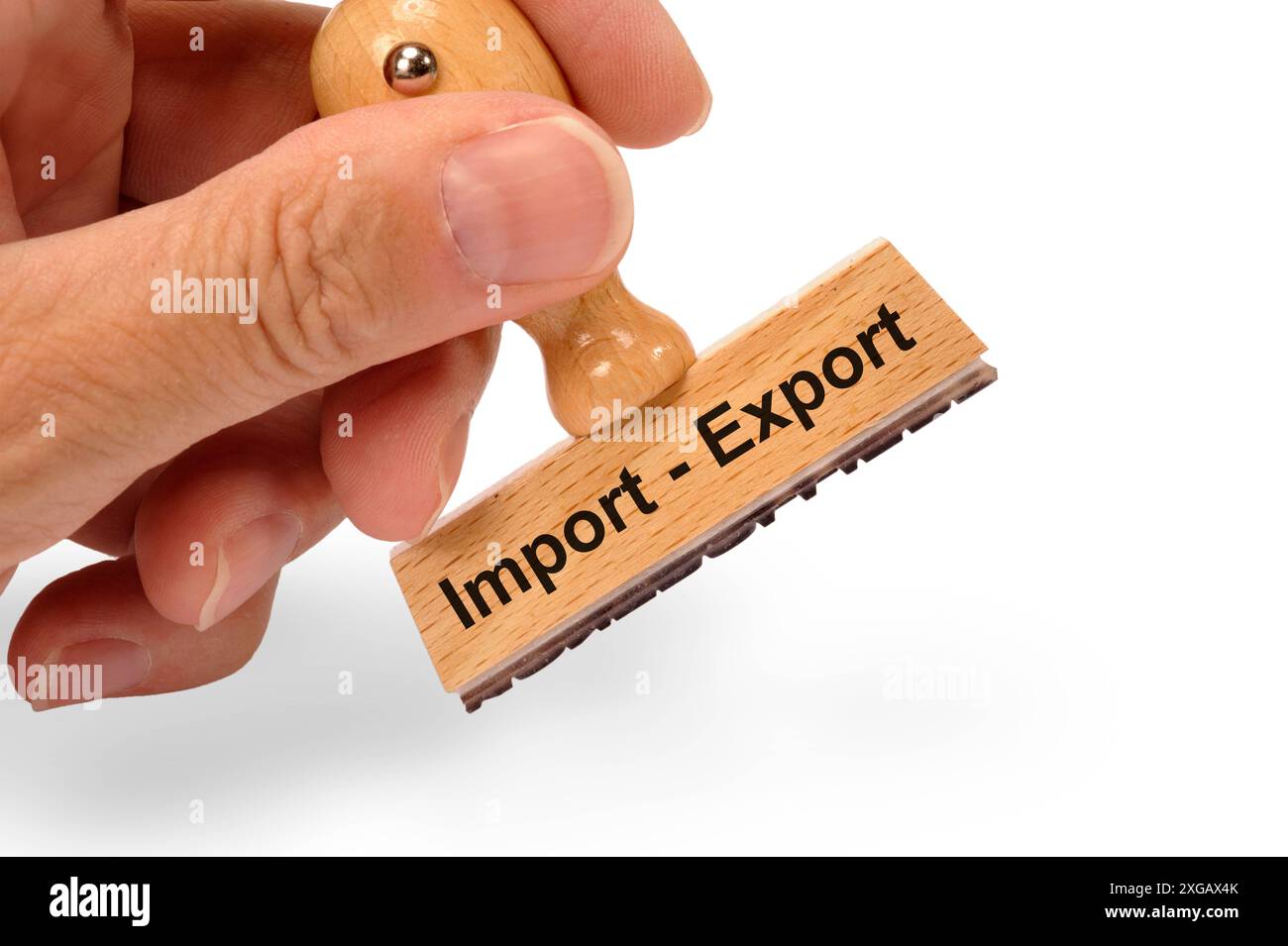 Import - Export Ein Holzstempel ist beschriftet mit dem Aufdruck Import ...