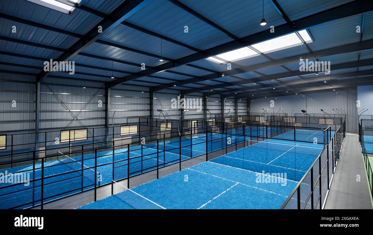 A blue padel tennis court with a blue net Stock Photo - Alamy