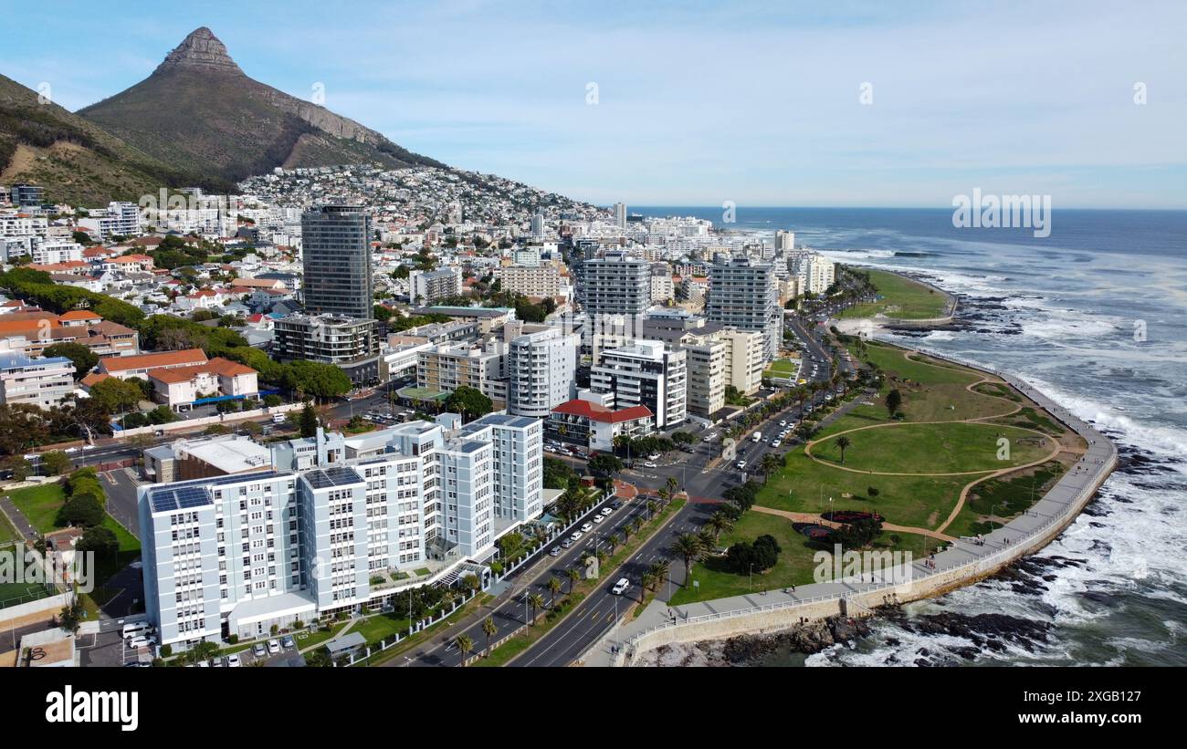 Sea Point Cape Town promenade and beachfront with Lions head in the ...