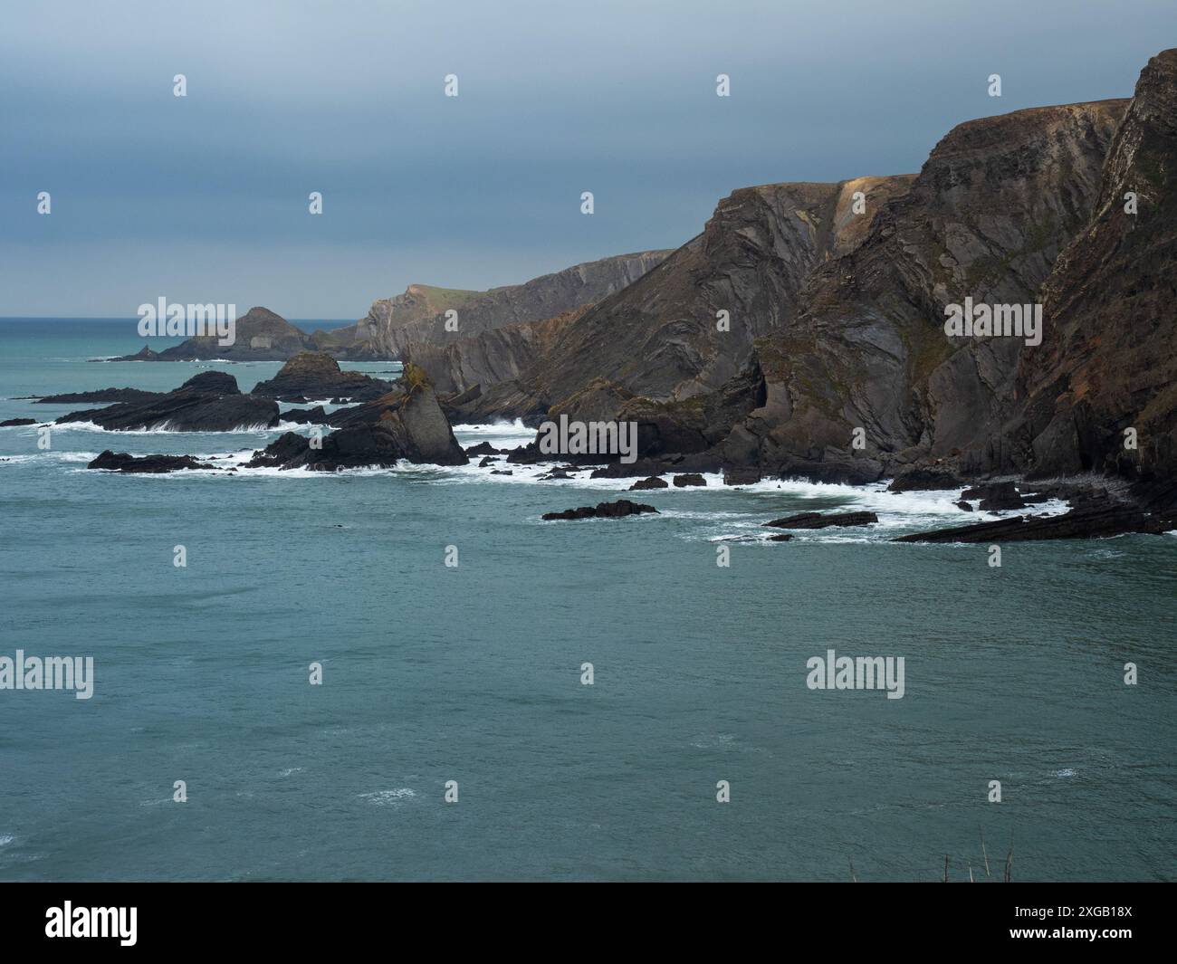 Folds in the sedimentary rock of the coastal cliffs, Hartland Quay ...