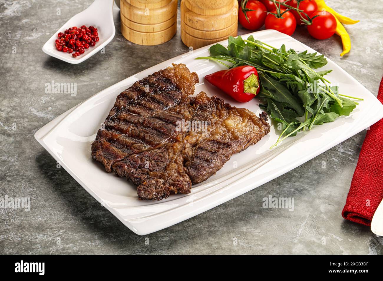 Grilled chuck roll beef steak with arugula Stock Photo - Alamy