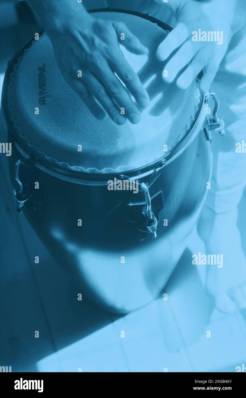 Hand drumming hi-res stock photography and images - Alamy