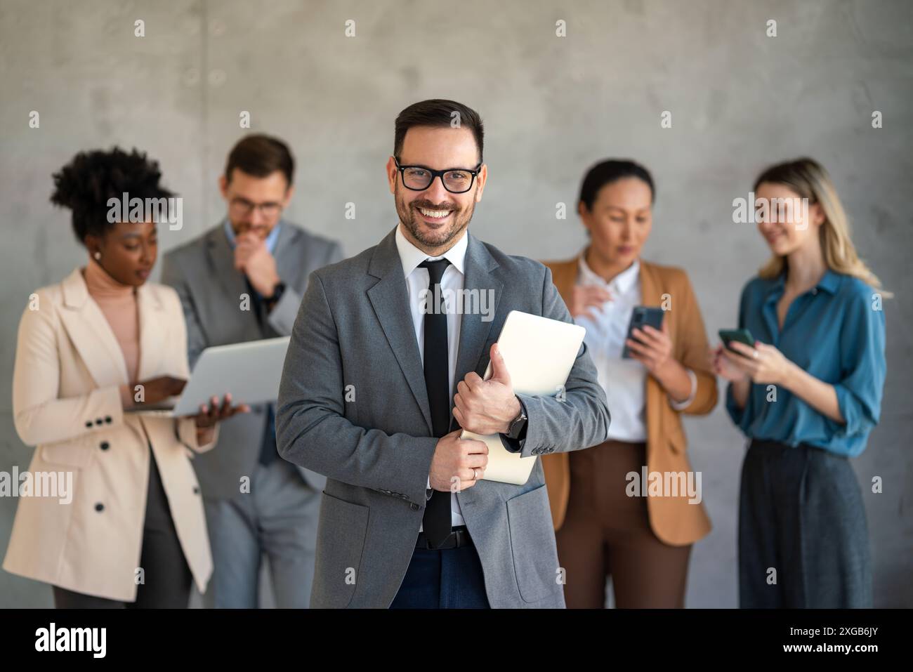 Portrait of successful business man, entrepreneur while multiethnic ...
