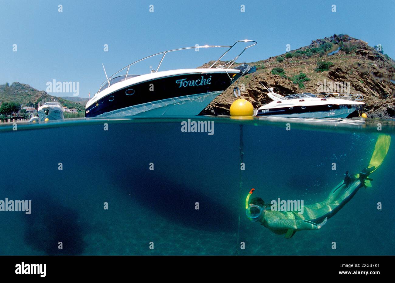 Skin diving in front of a yacht, split image, Spain, Mediterranean Sea ...