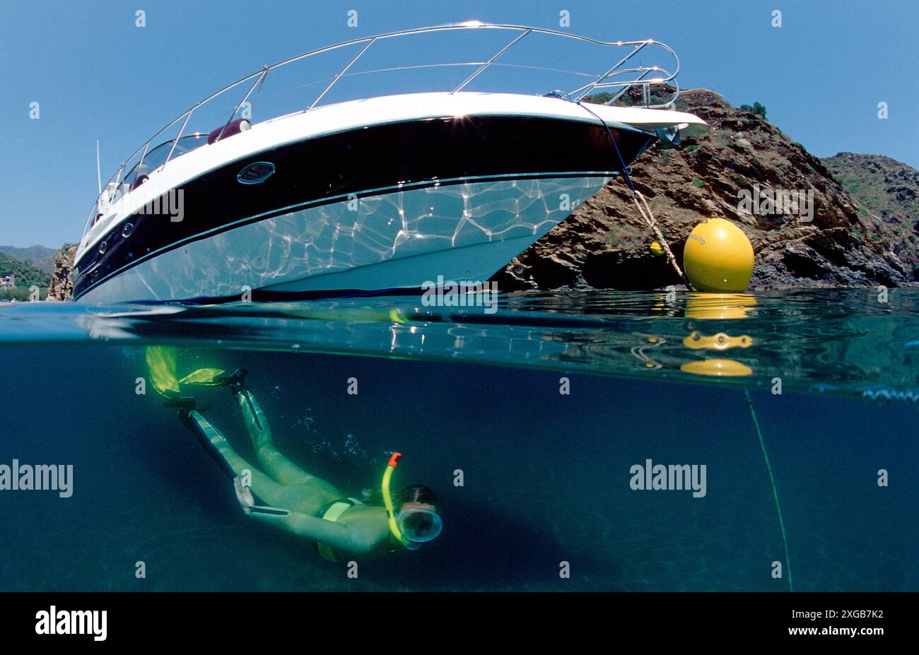 Skin diving in front of a yacht, split image, Spain, Mediterranean Sea ...