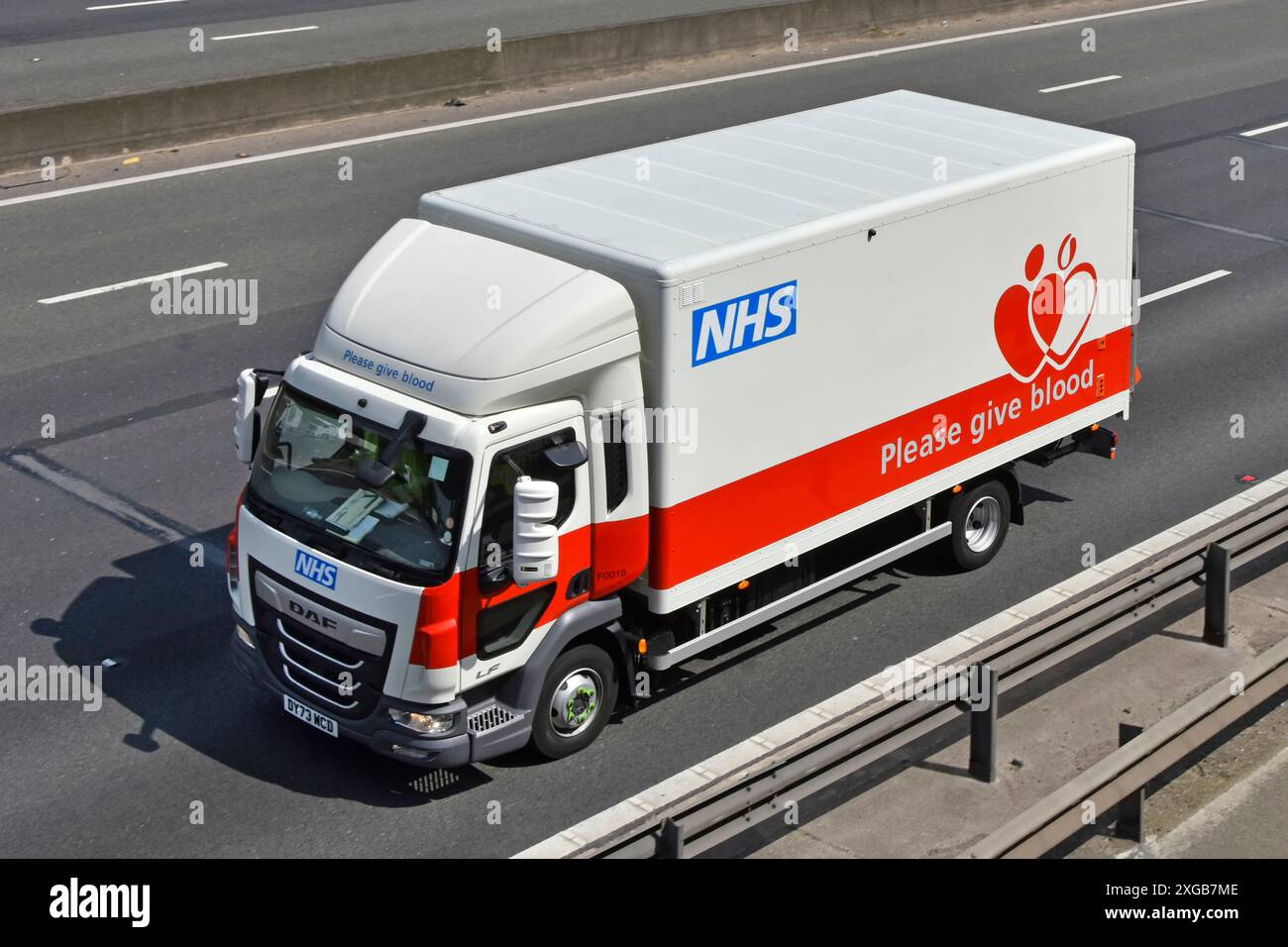 DAF lorry truck & driver aerial side view request please give blood NHS ...