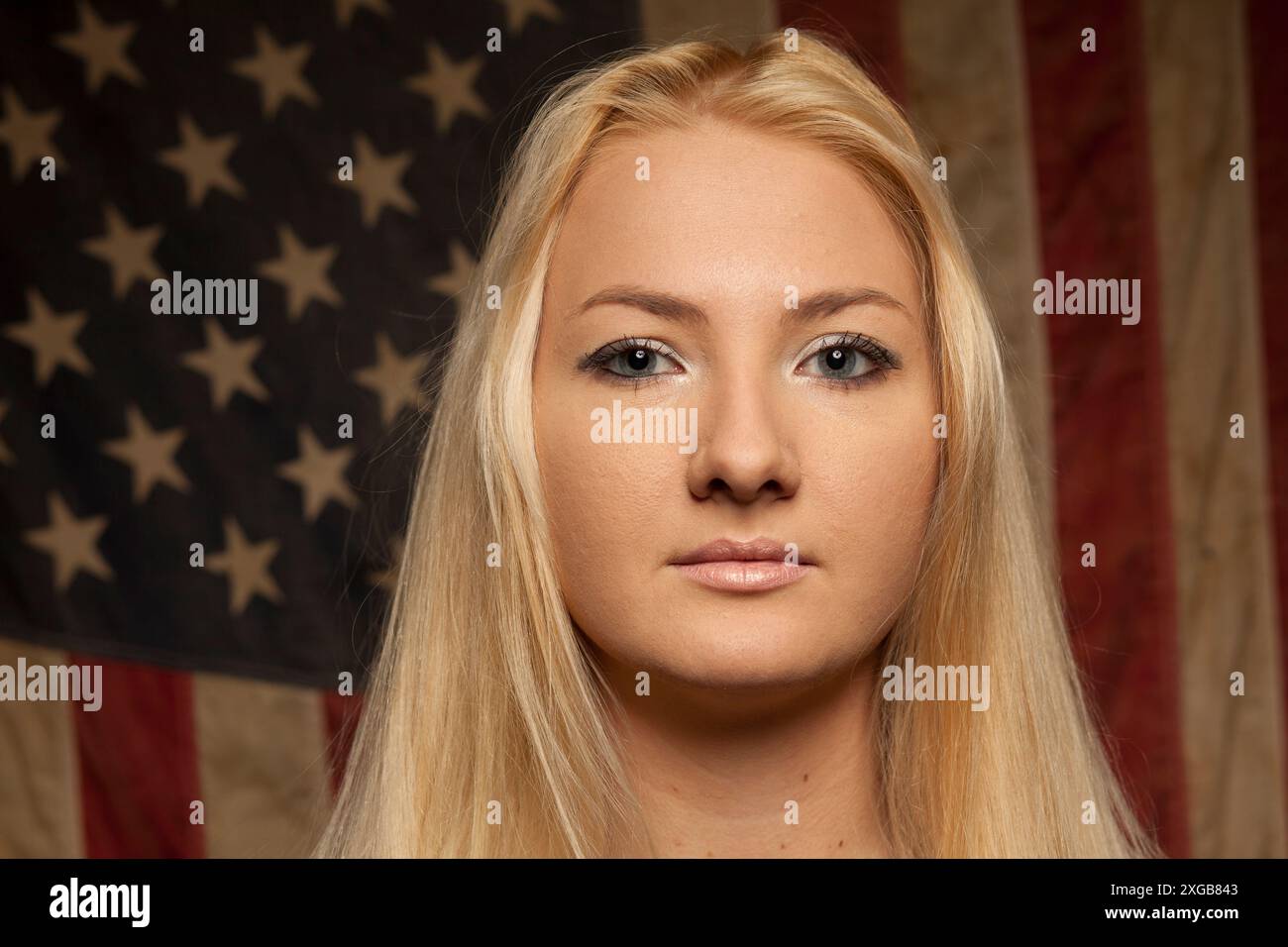 A woman poses for a portrait as a first time voter in the November 2012 ...