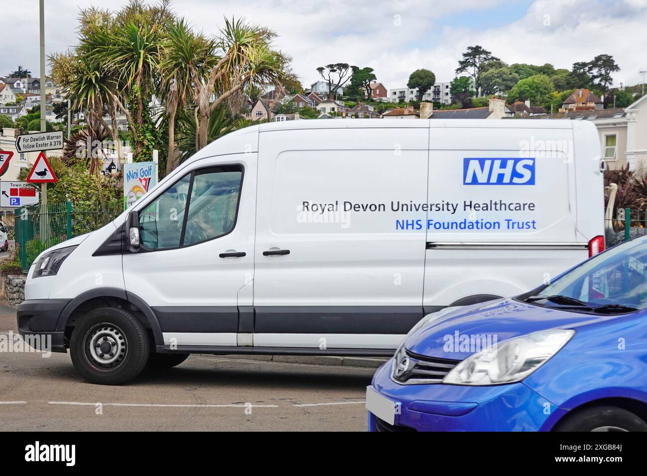 Royal Devon University Healthcare NHS Foundation Trust driver in white ...