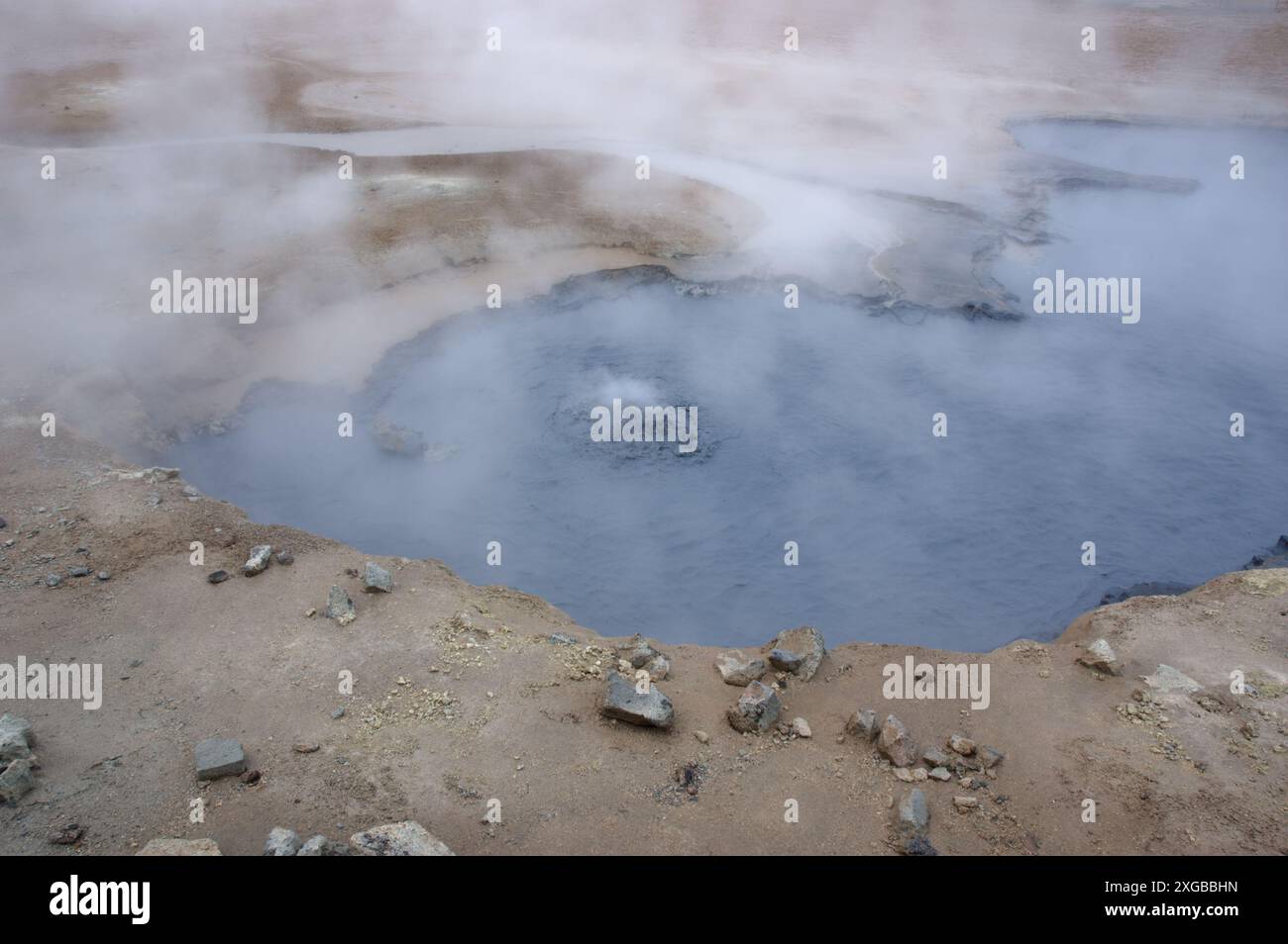 Boiling mud pool at Námafjall geothermal area, near Lake Mývatn, north ...