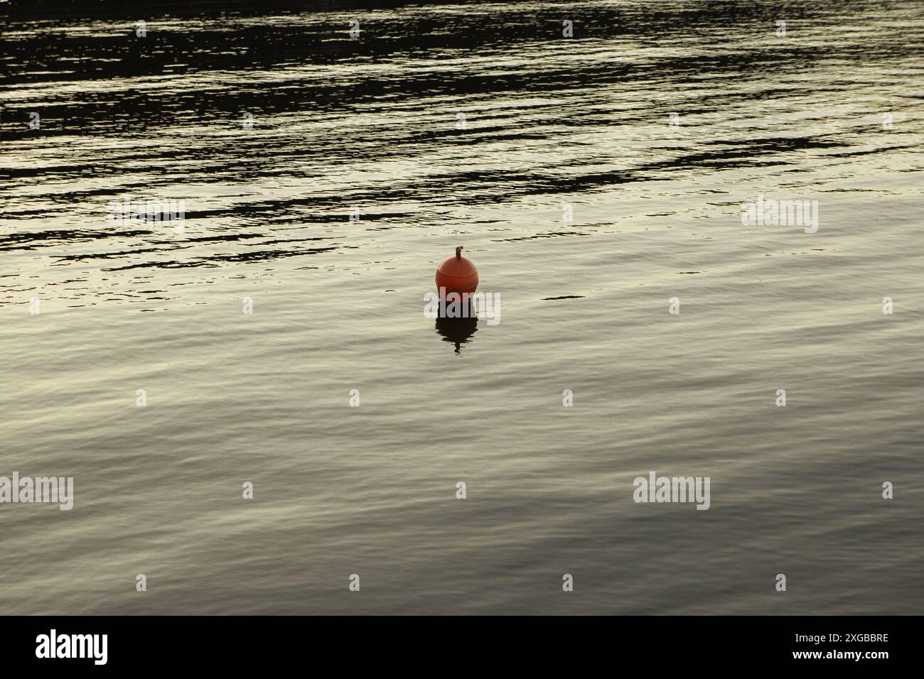 red buoy on the water Stock Photo - Alamy