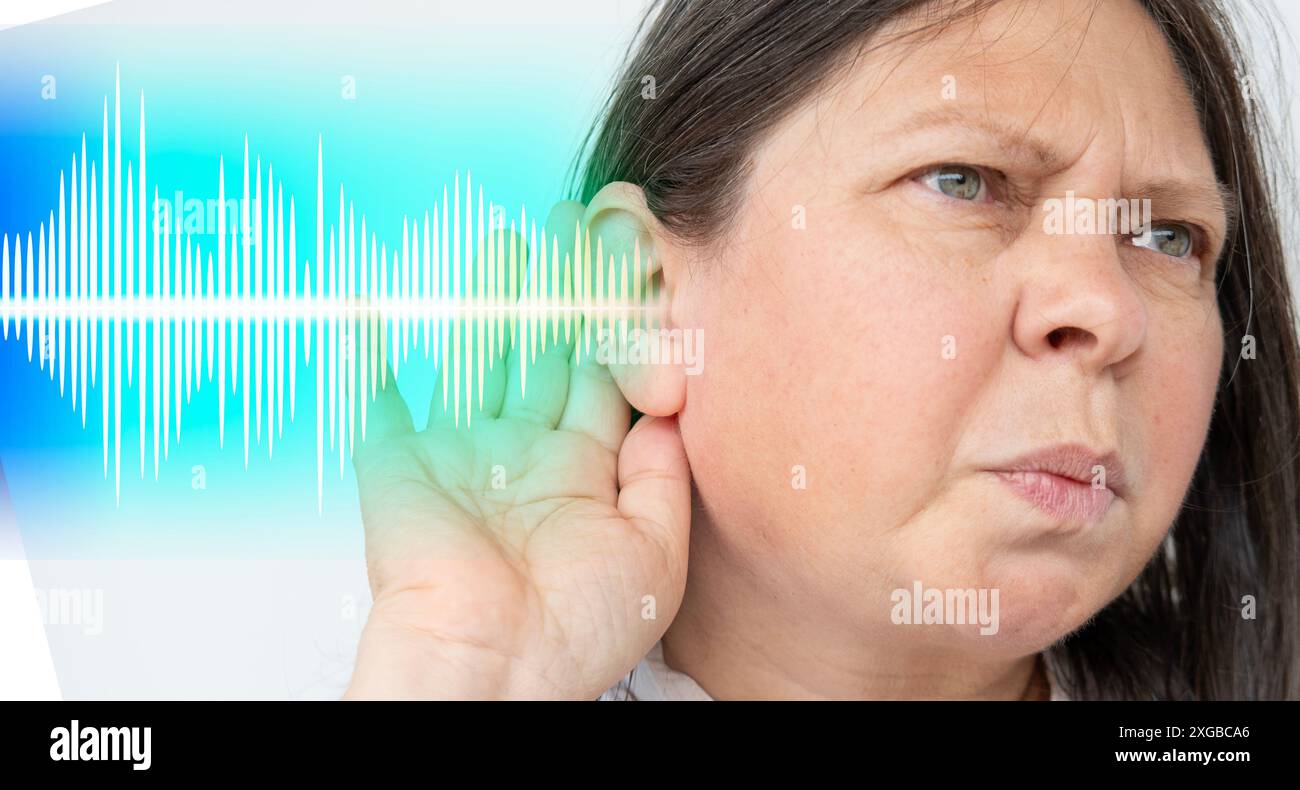 caucasian mature woman holding ear closeup listening, sound wave ...