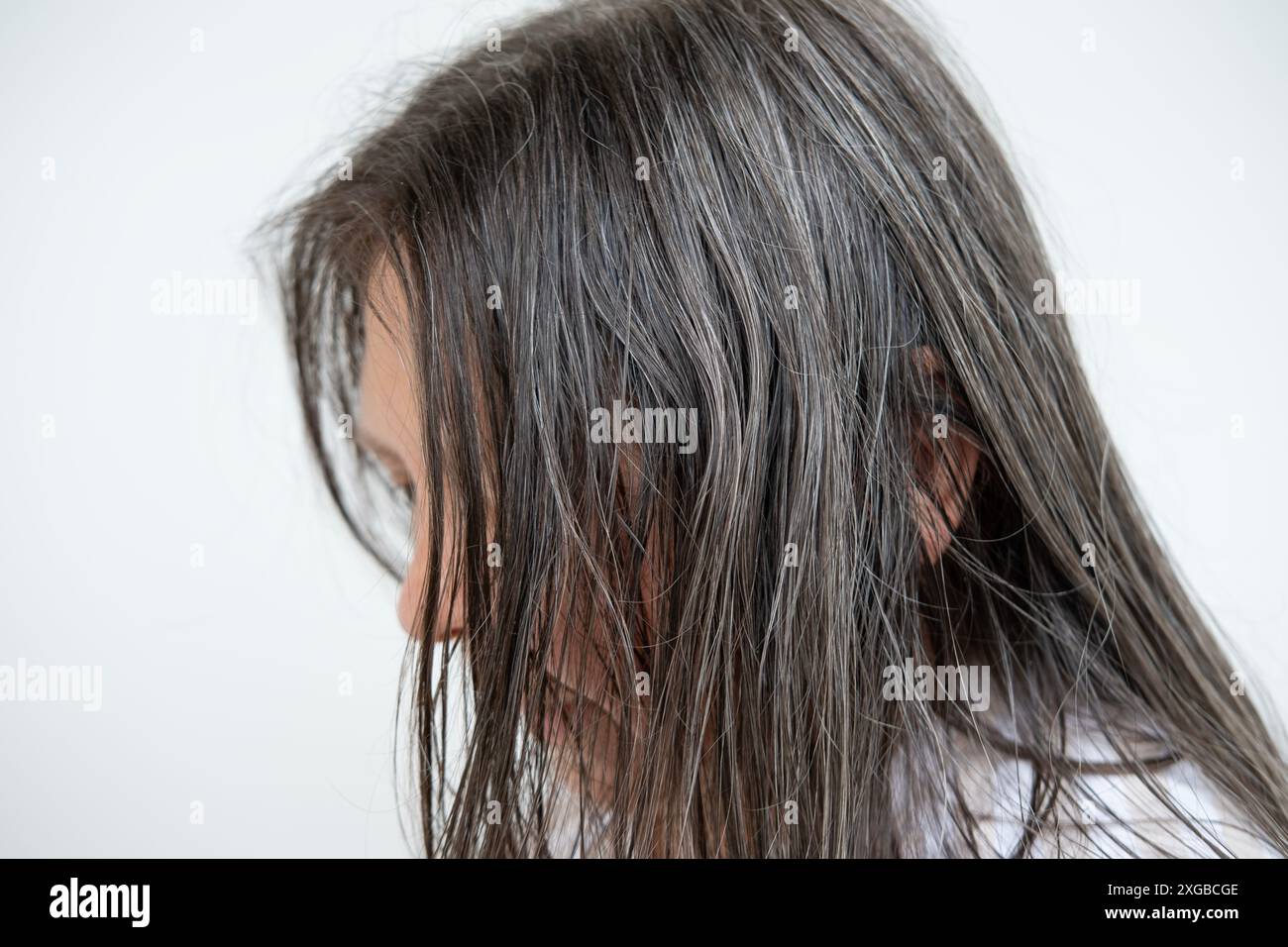Disregarded appearance woman with careless long brown oily hair, self ...