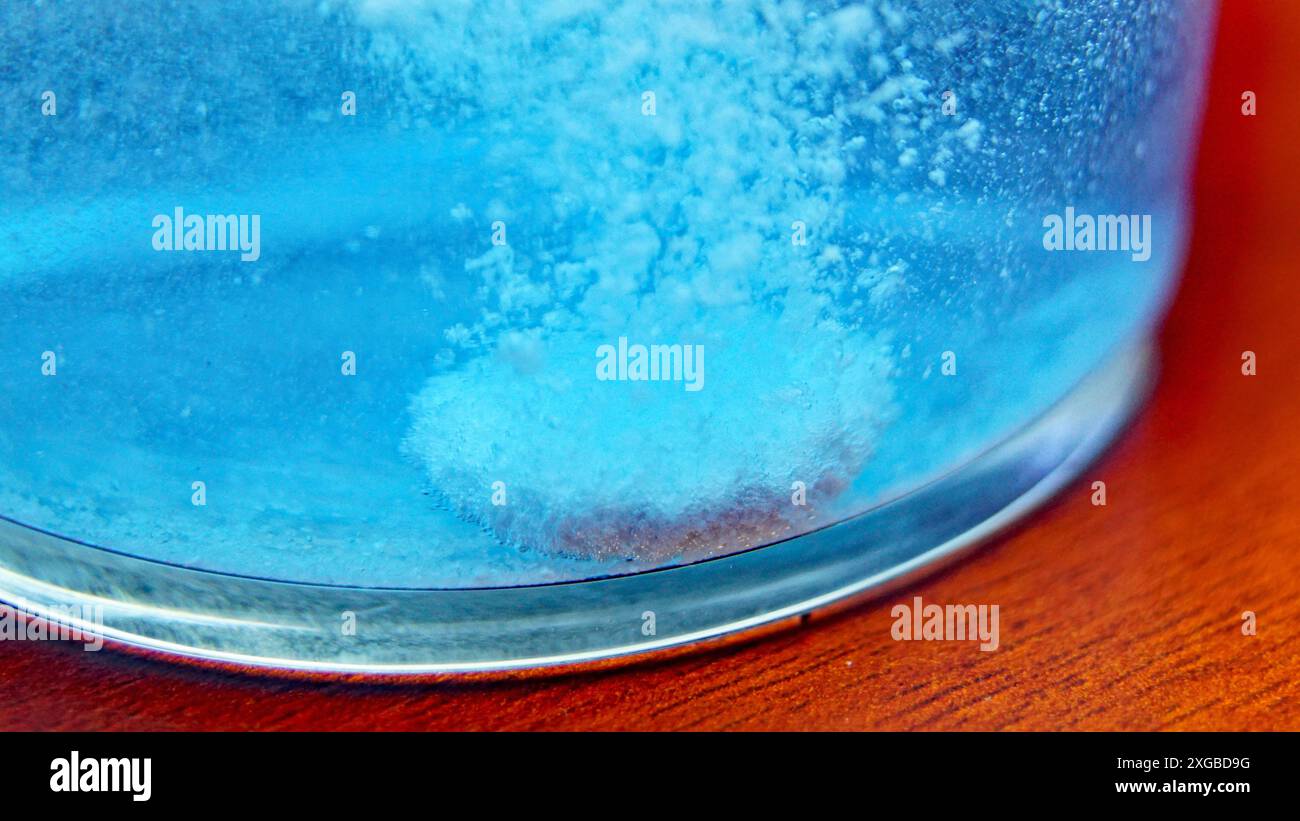 Effervescent tablet in water bubbles hi-res stock photography and ...