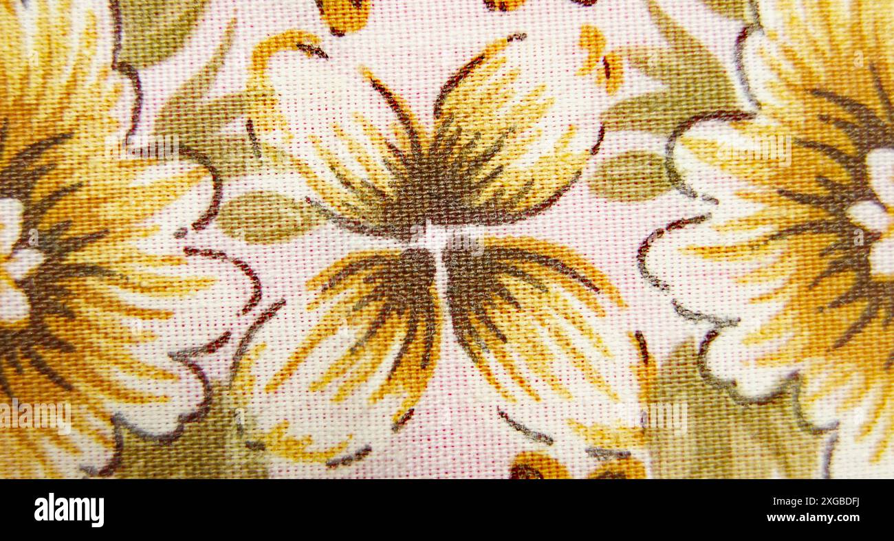 Fabrics and textiles with embroidery and prints of shapes and colors ...