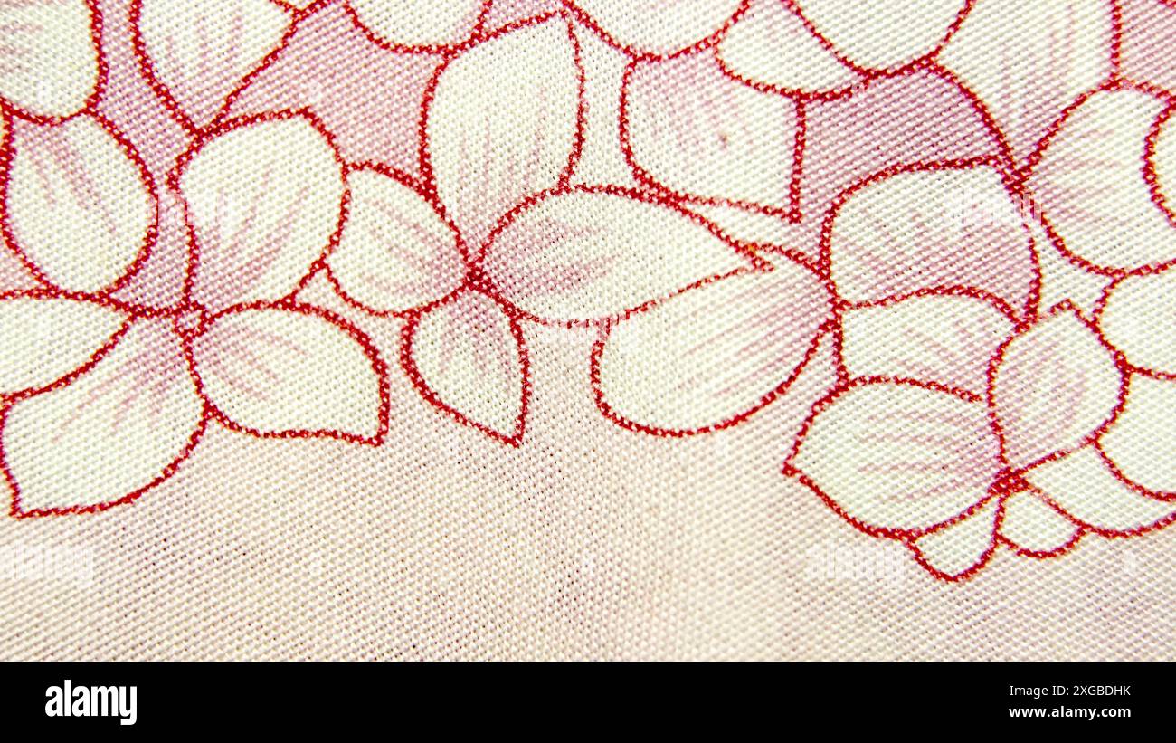 Fabrics and textiles with embroidery and prints of shapes and colors ...