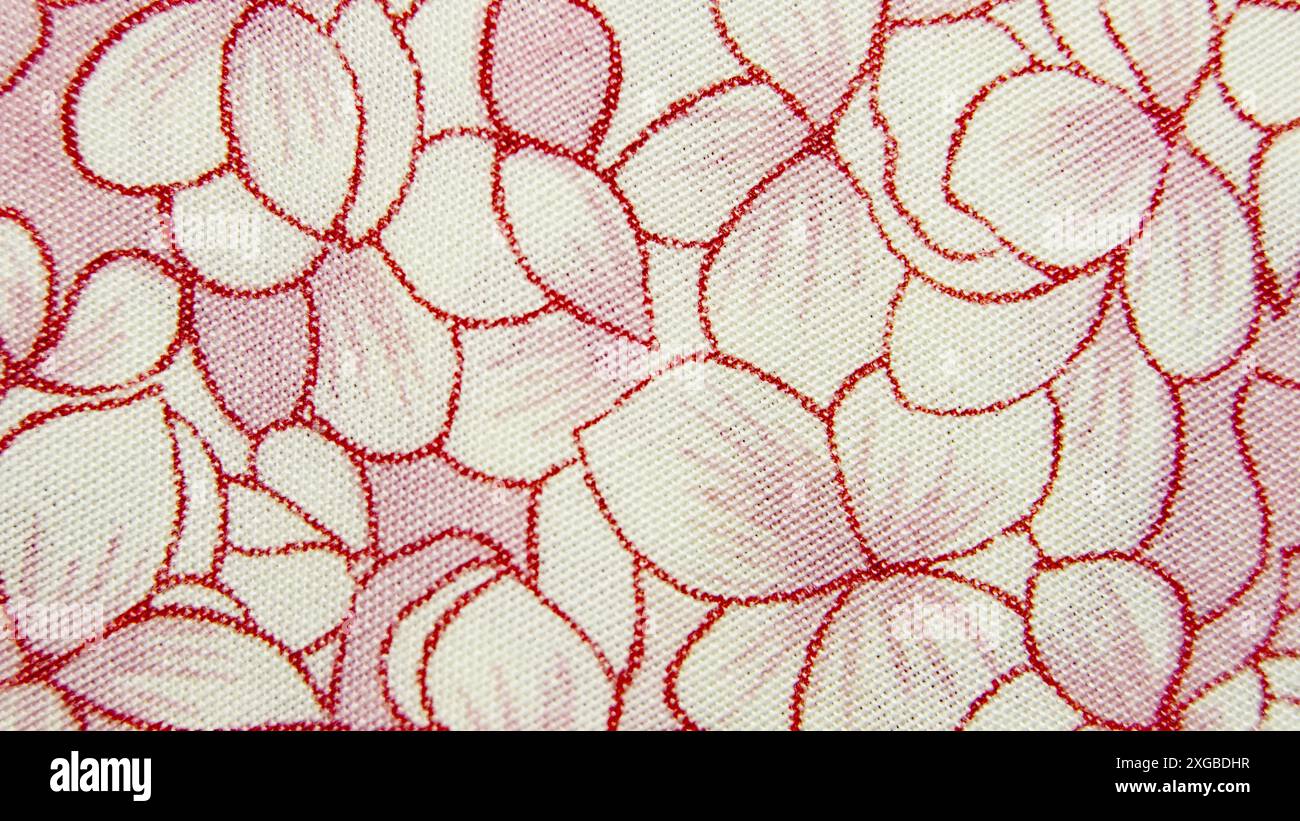 Fabrics and textiles with embroidery and prints of shapes and colors ...