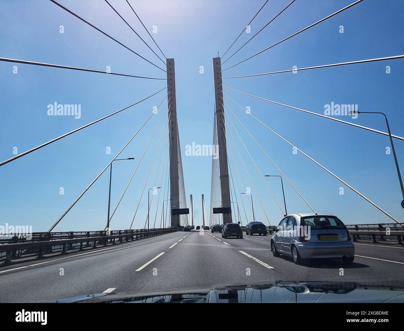 Cars travelling across the Forth Road Bridge spanning the Firth of ...