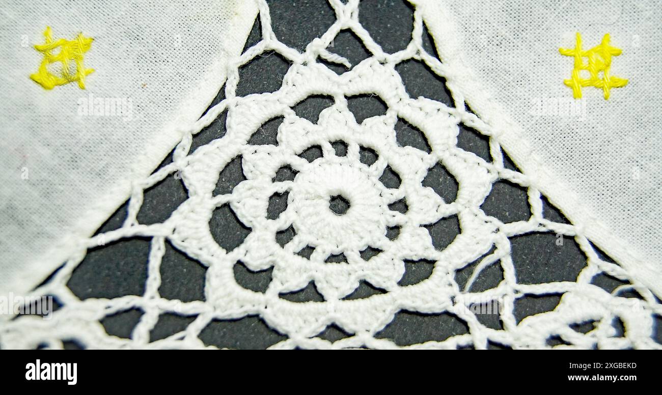 Fabrics and textiles with embroidery and prints of shapes and colors ...