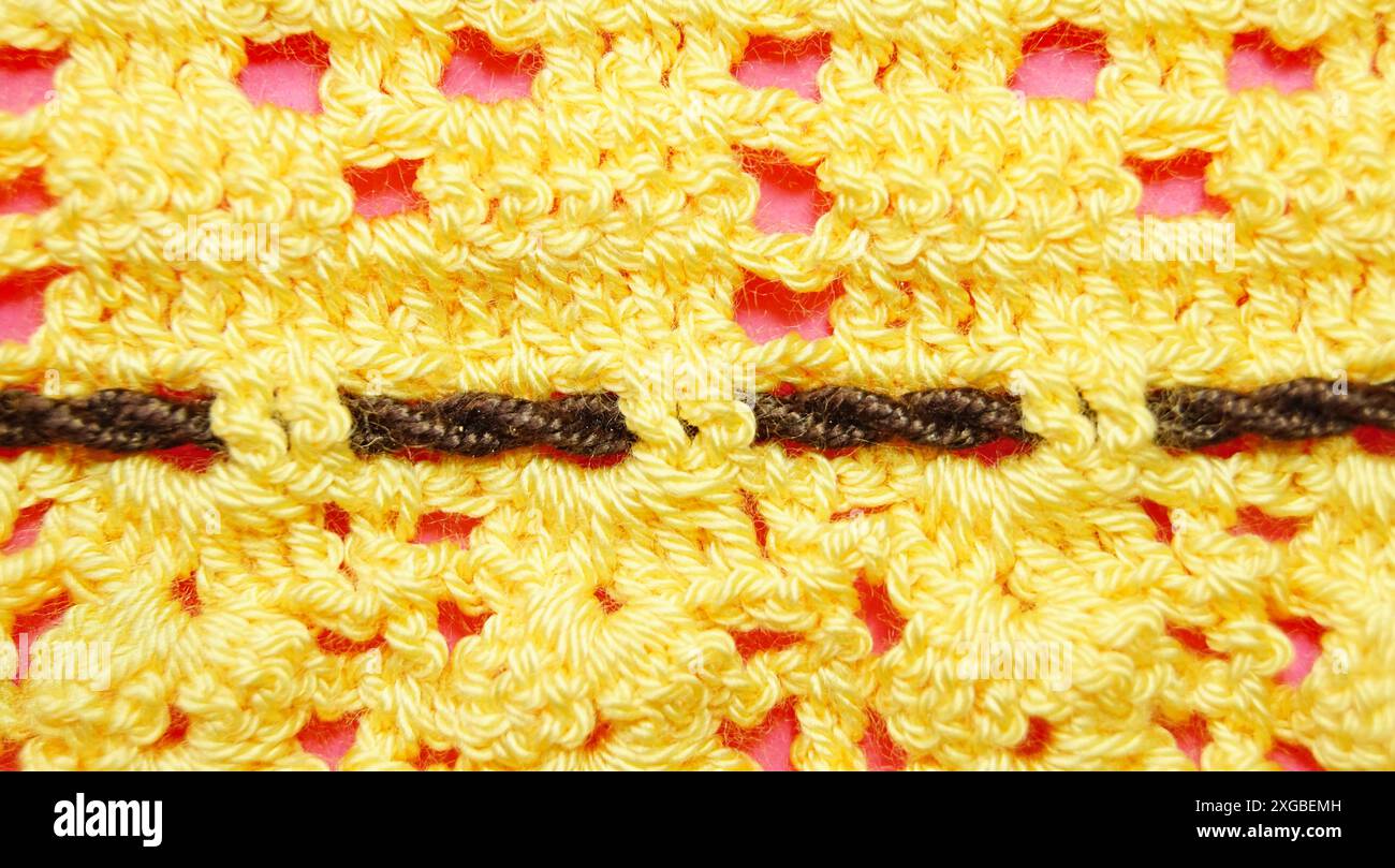 Fabrics and textiles with embroidery and prints of shapes and colors ...