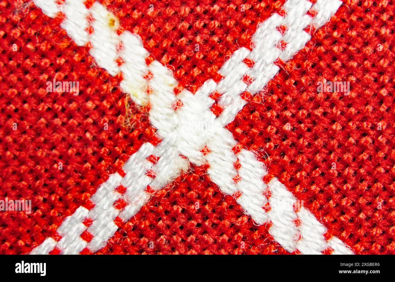 Fabrics and textiles with embroidery and prints of shapes and colors ...