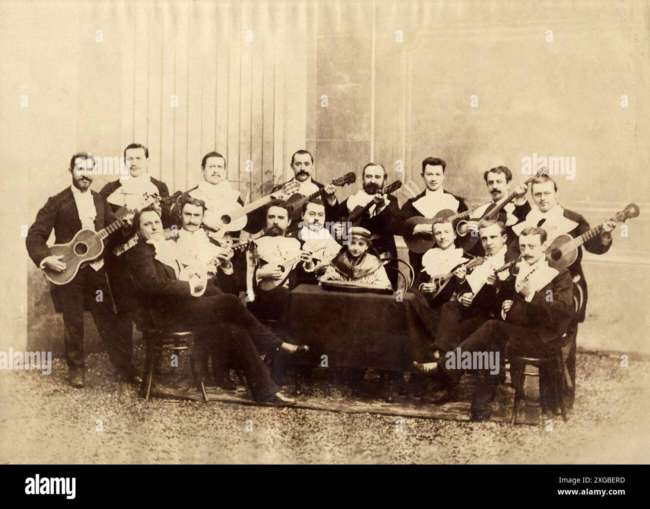 "Orchestra of 15 circus musicians posing around the little fortune ...