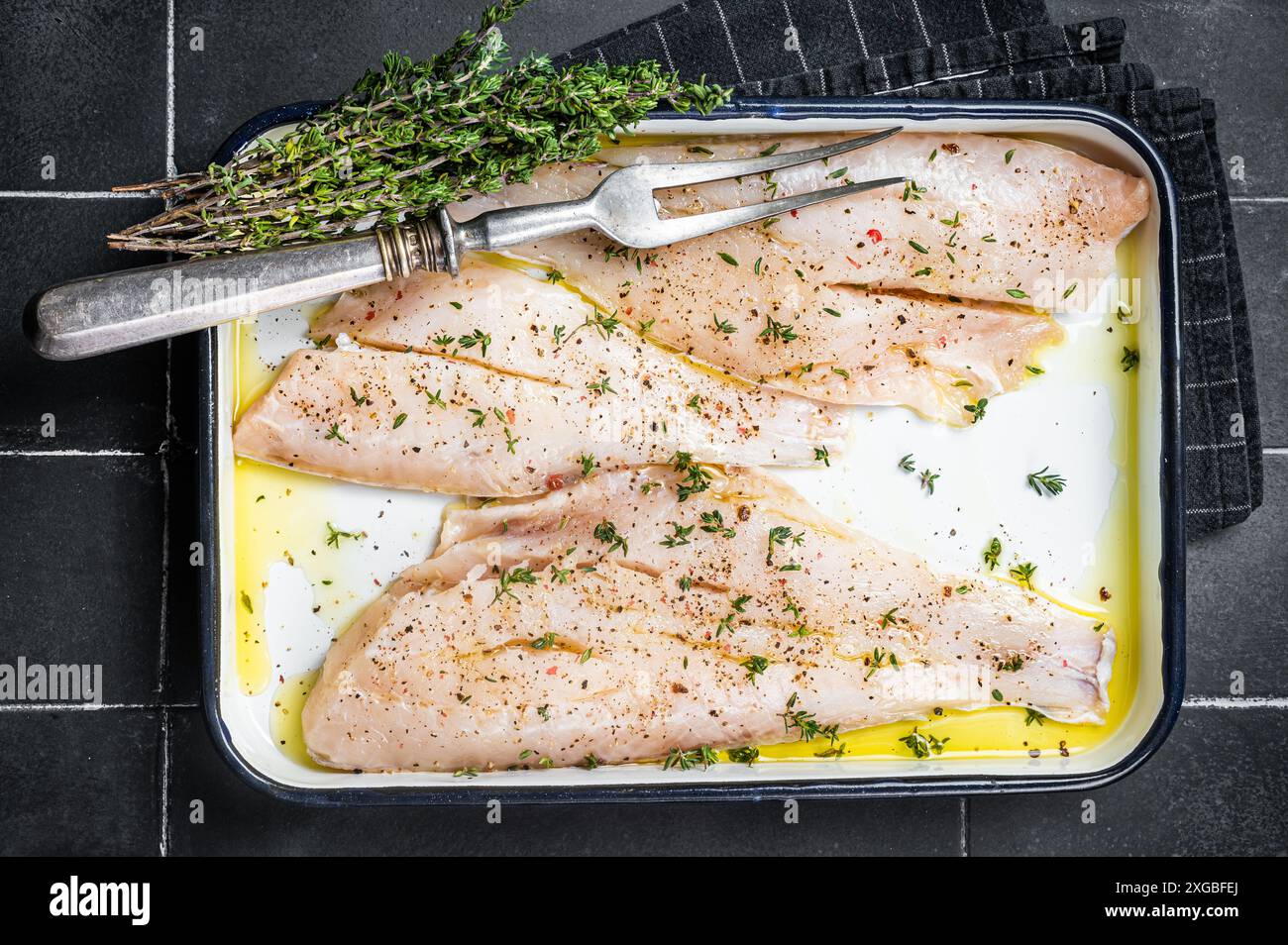 Marinated ocean red perch fillet with olive oil, thyme and spices ...