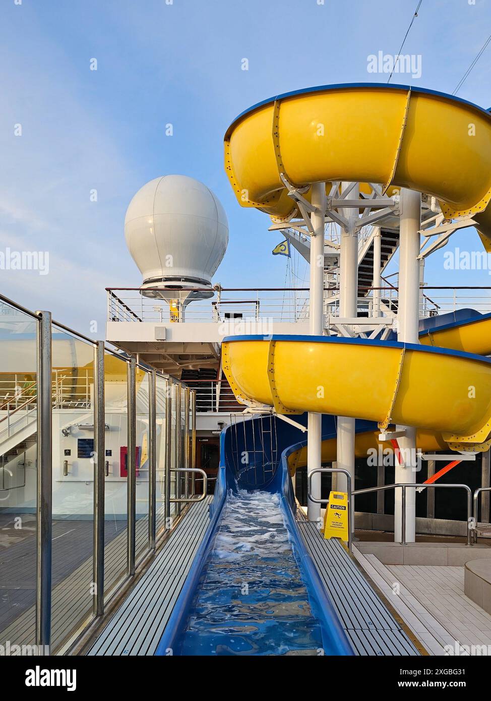 A Water slide on a cruise ship deck with clear blue sky in Sasebo ...