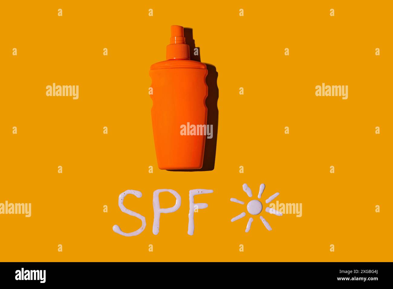 Sunscreen SPF cream on yellow background Stock Photo - Alamy