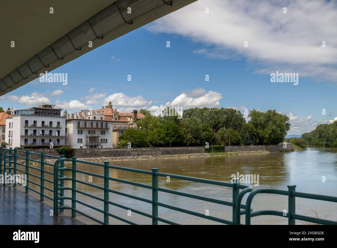 Bridge for pedestrians cross the river Vah, from the downtown to the ...