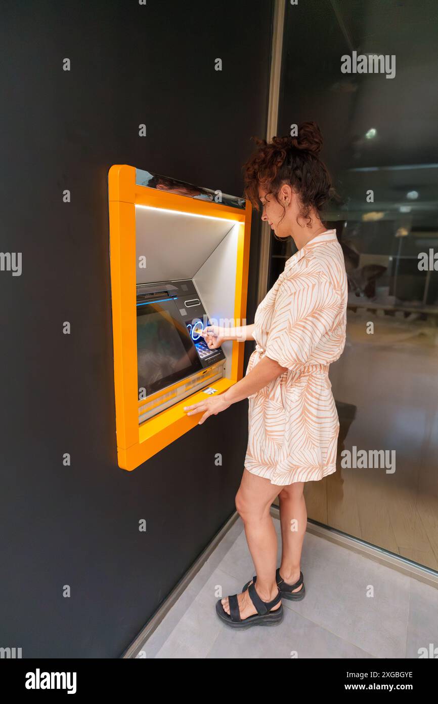 Person use atm hi-res stock photography and images - Alamy