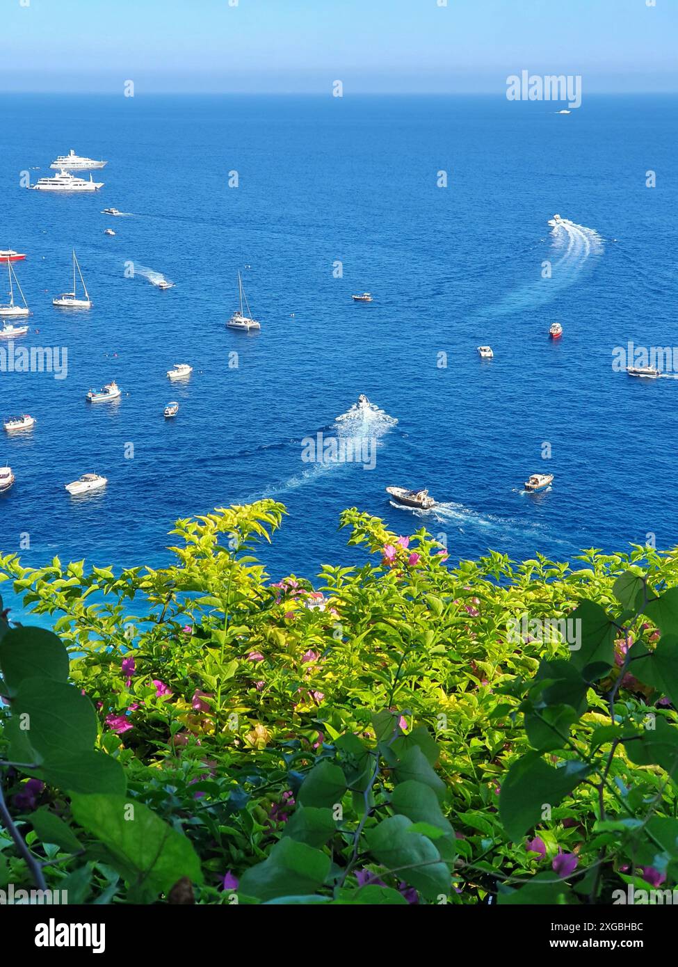 Blue Ocean at Positano Bay with Yachts and Sail Boats and Blooming ...